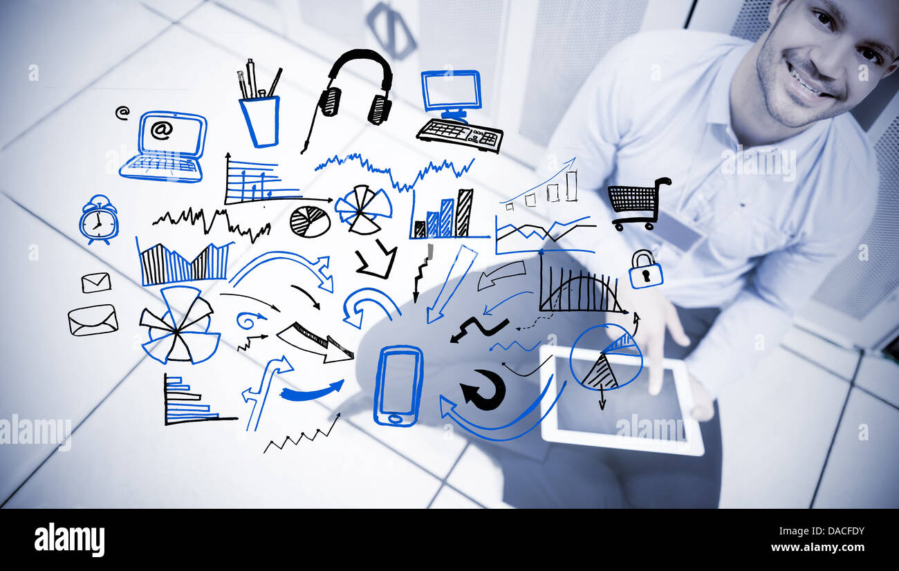 Happy man sitting next to a drawing of charts Stock Photo - Alamy