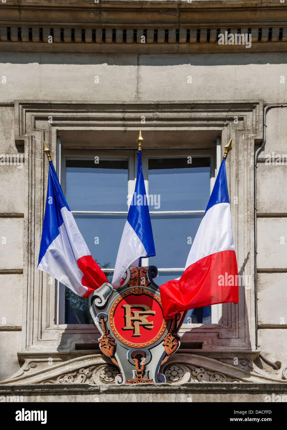 Three French flags on the Avignon city hall window Stock Photo - Alamy