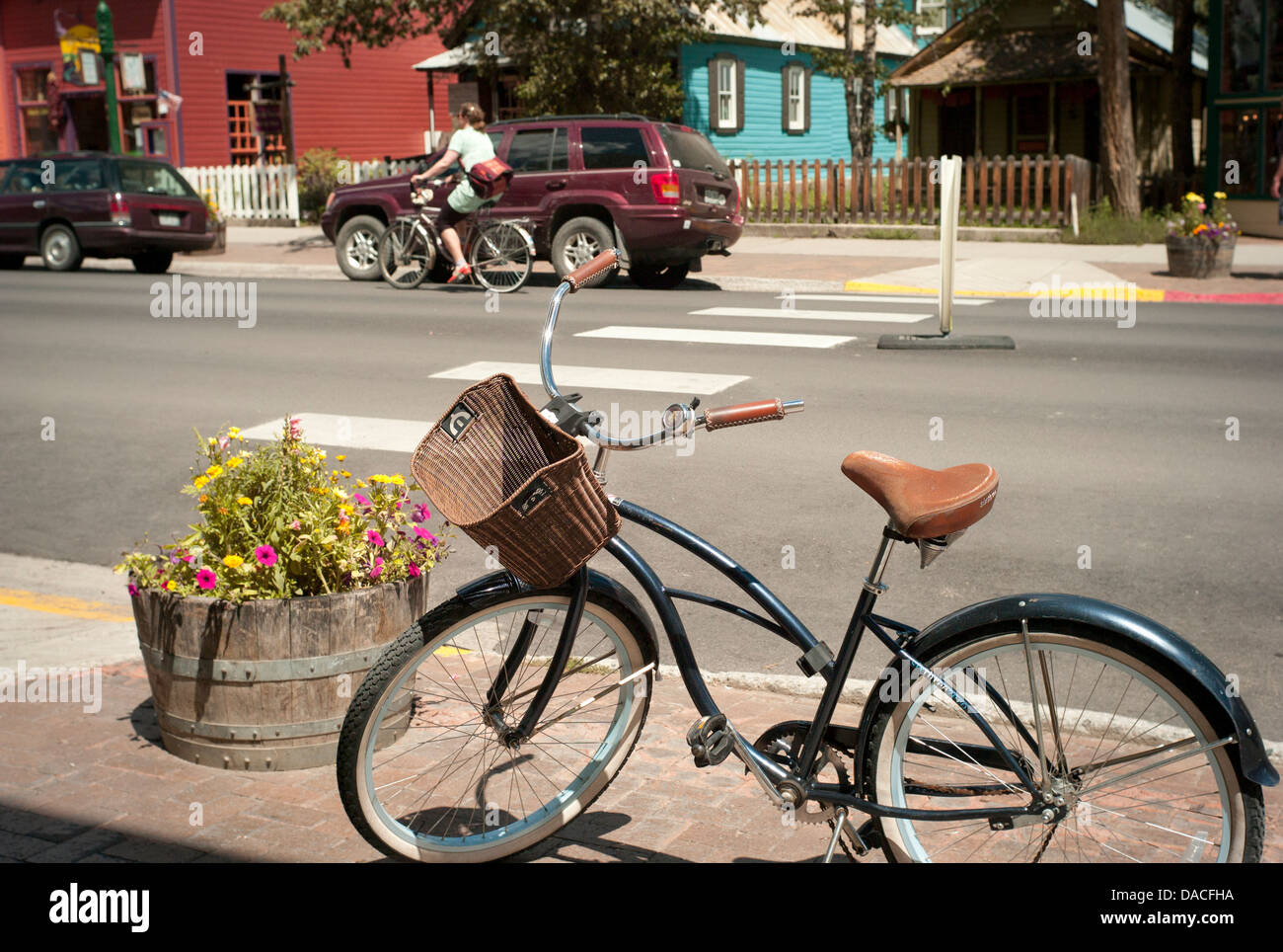 Bicycle parked on a town sidewalk Stock Photo - Alamy