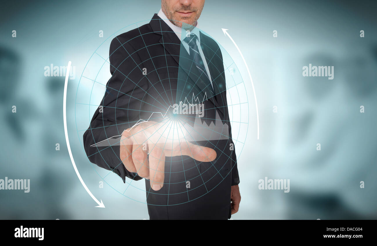Businessman selecting a futuristic interface with arrows Stock Photo ...