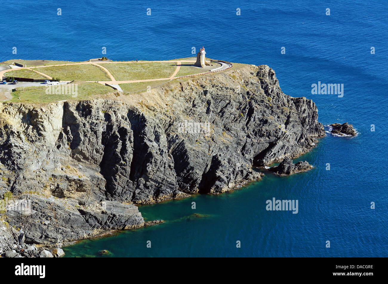 Cliff with a lighthouse in Cap Cerbere at the frontier between Spain ...