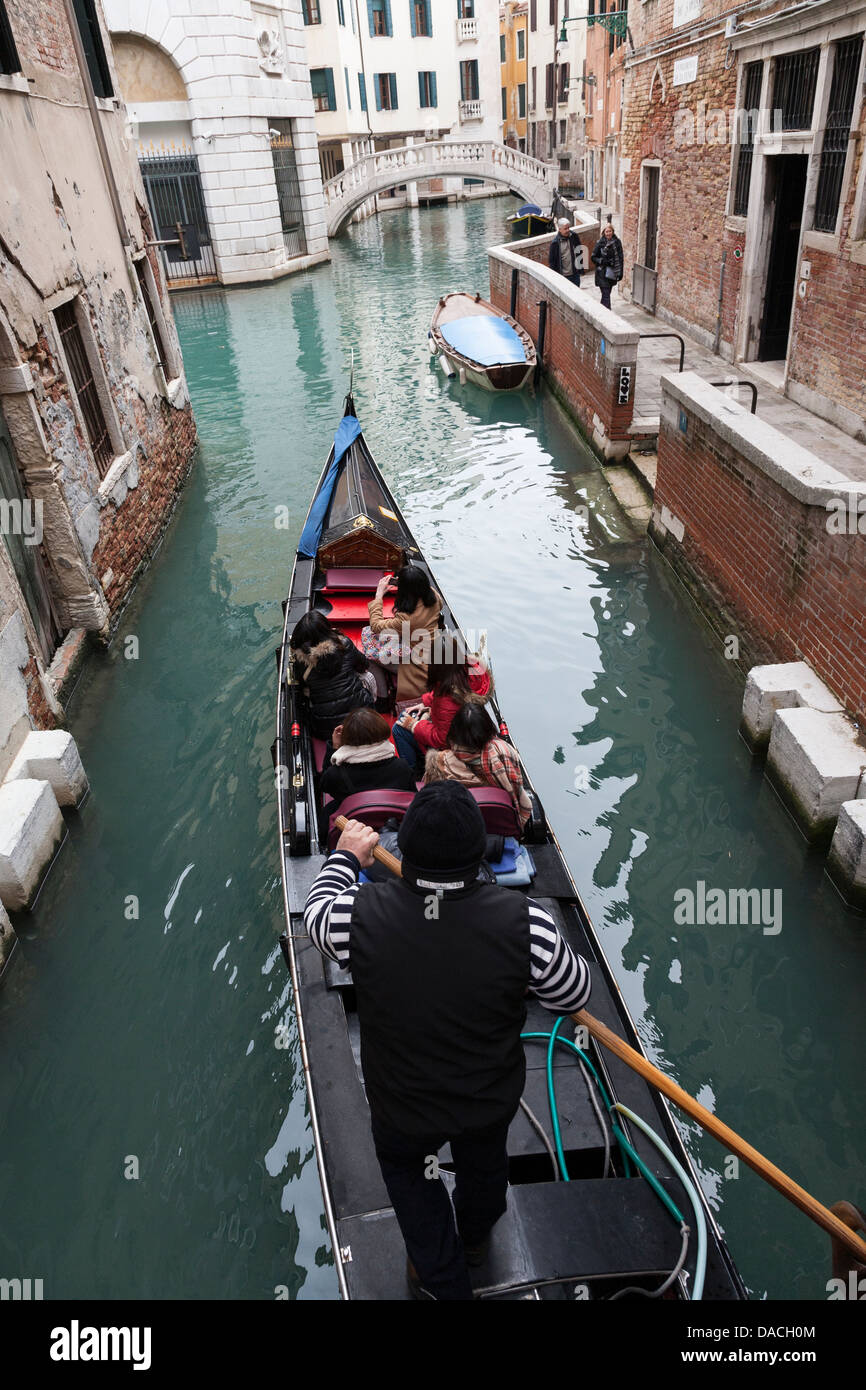 Gondoliere and Gondola in Canal, Venice, Italy Stock Photo - Alamy