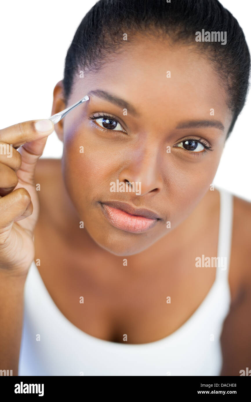 Woman using tweezers Stock Photo - Alamy