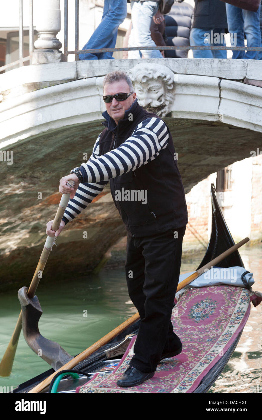 Gondoliere and Gondola in Canal, Venice, Italy Stock Photo - Alamy