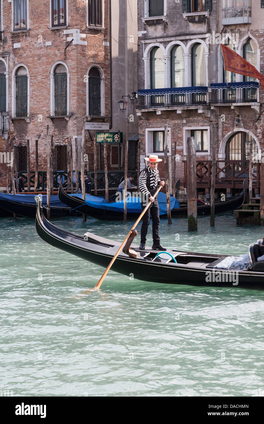 Gondoliere and Gondola in Canal Grande, Venice, Italy Stock Photo - Alamy