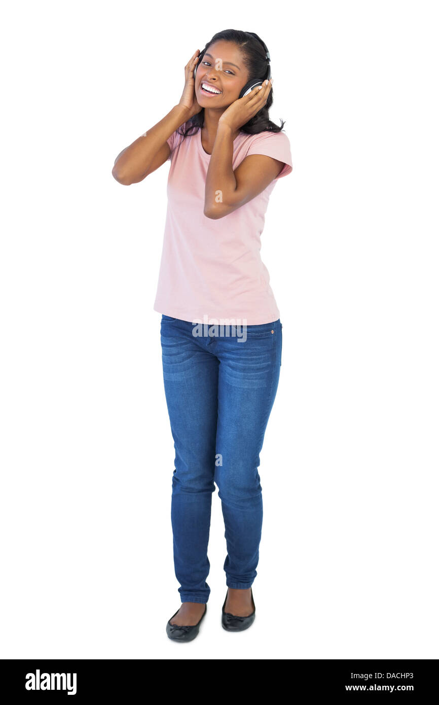 Young black woman listening music Cut Out Stock Images & Pictures - Alamy