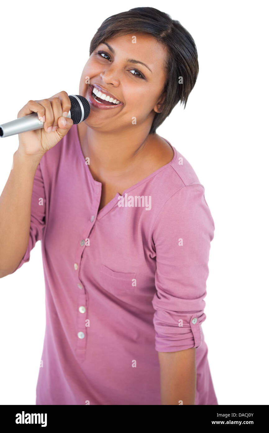 Smiling into microphone hi-res stock photography and images - Alamy