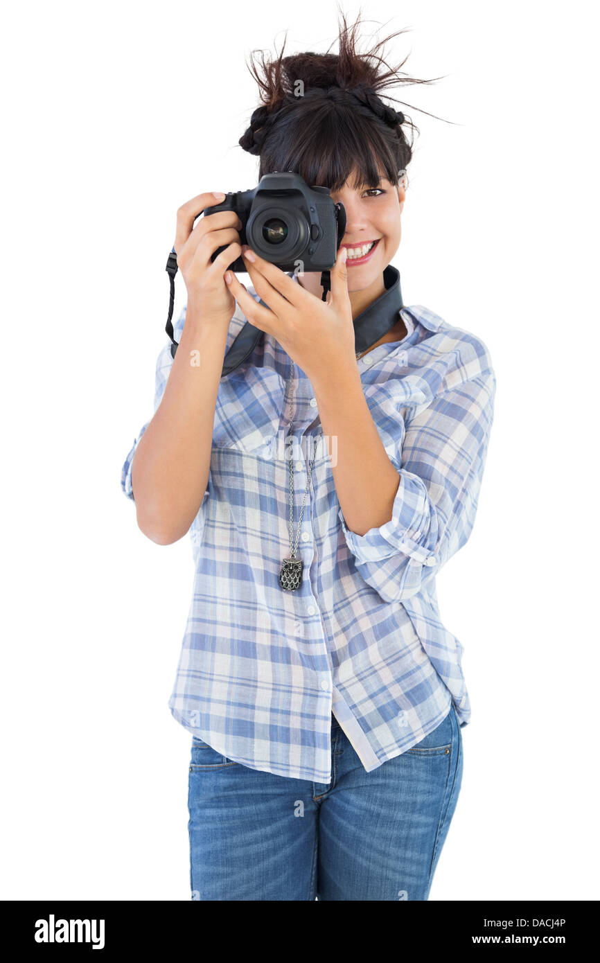 Young woman taking picture with her camera Stock Photo - Alamy