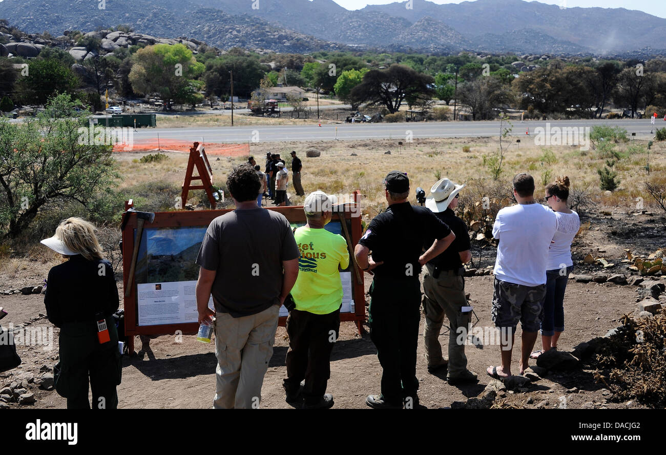 Yarnell AZ. July 10,2013. USA. Local residents at a sight that was put ...