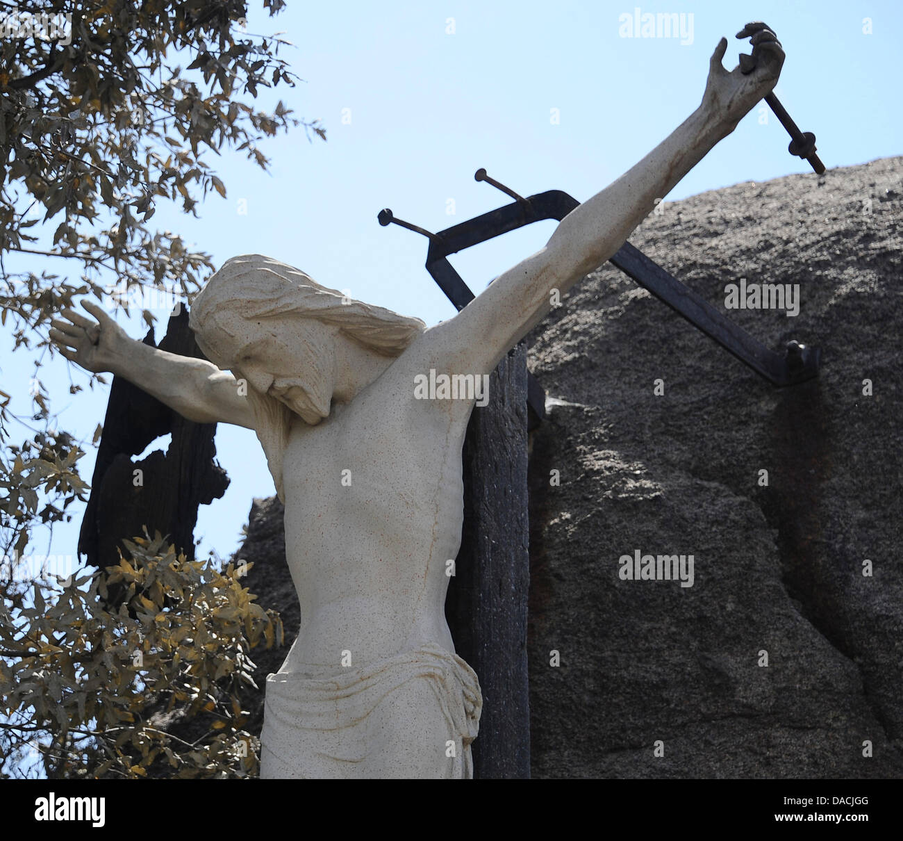 Yarnell AZ. July 10,2013. USA. A statue of Jesus Christ remains ...