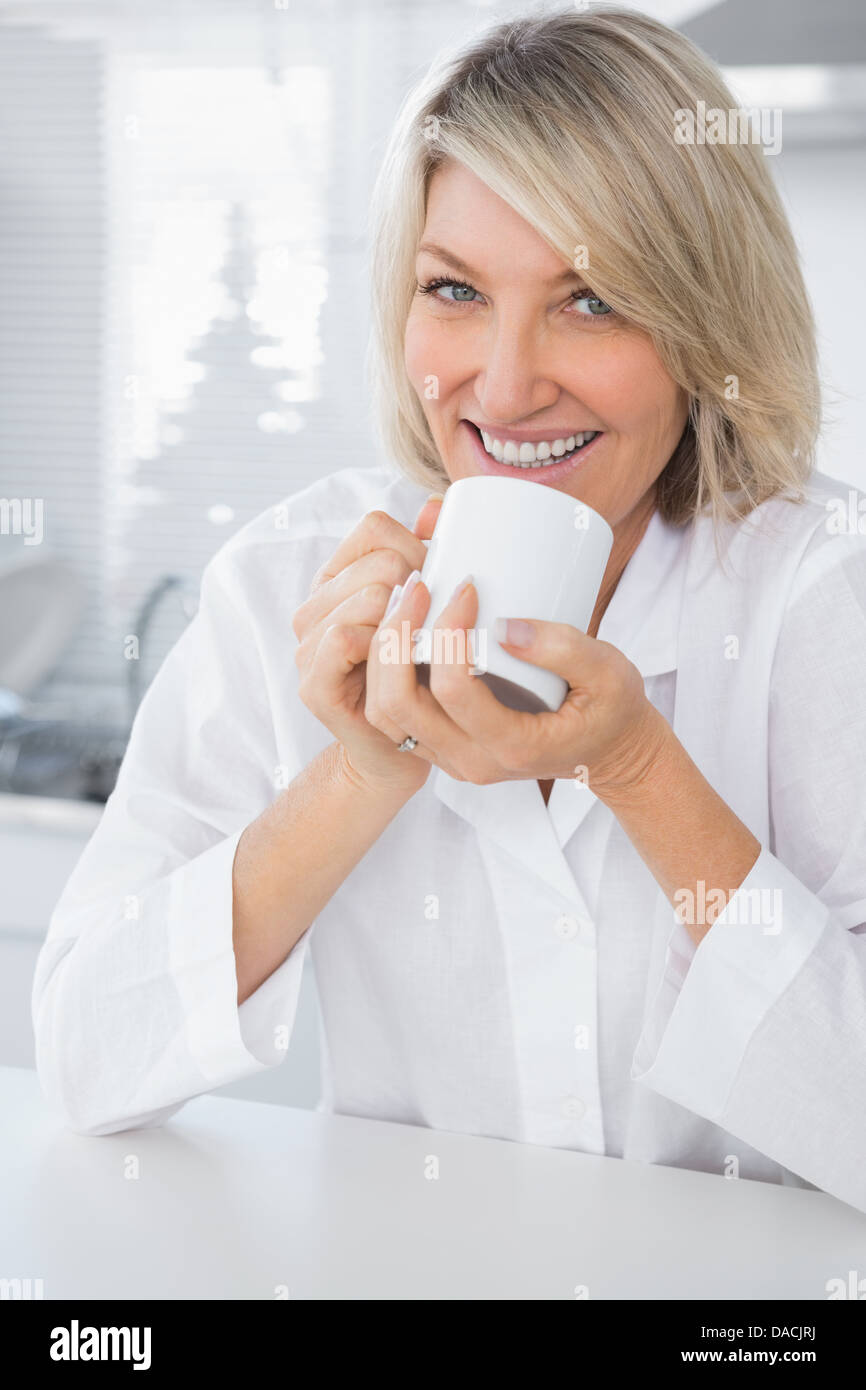 Mature woman morning coffee hi-res stock photography and images - Alamy