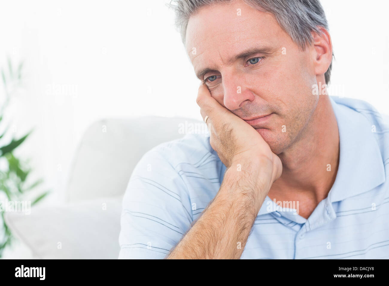 Depressed man thinking Stock Photo - Alamy