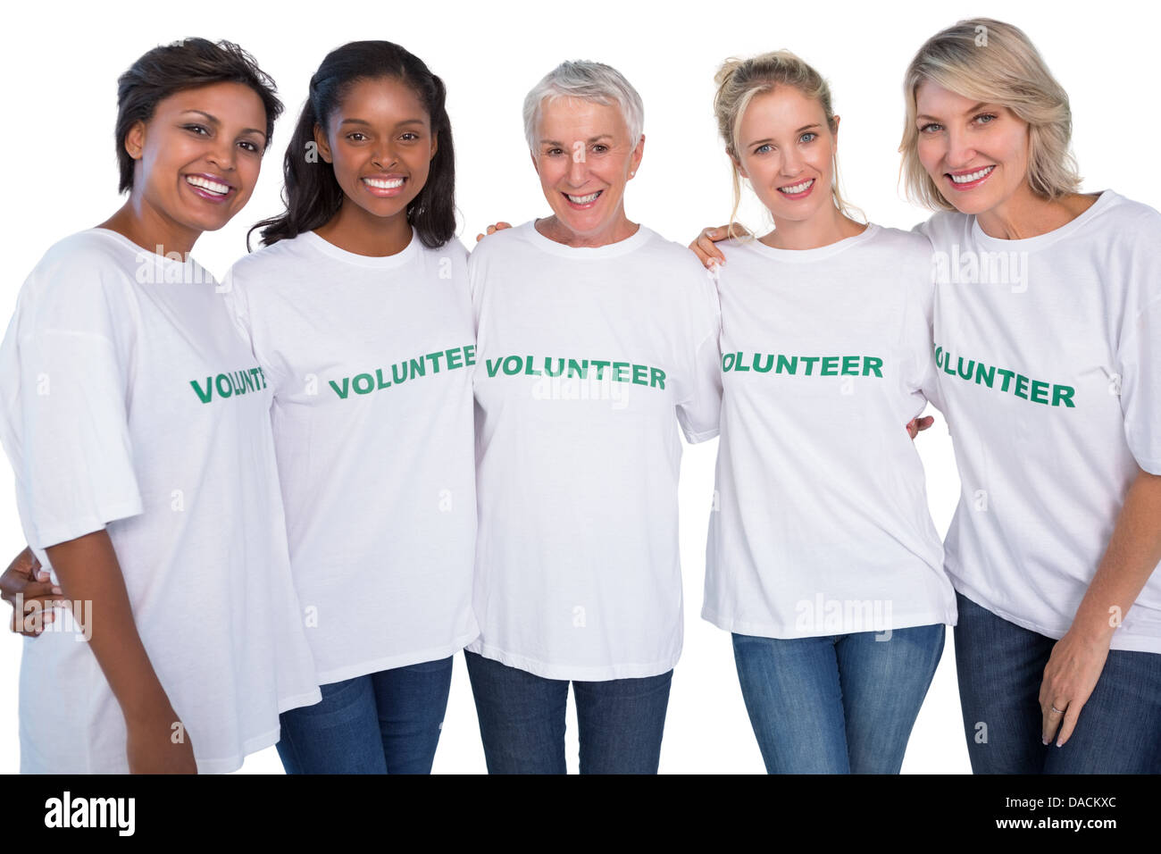 Group of female volunteers smiling at camera Stock Photo - Alamy