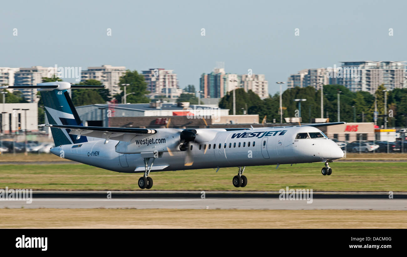 WestJet Encore Bombardier Q400 regional airliner airplane landing at ...
