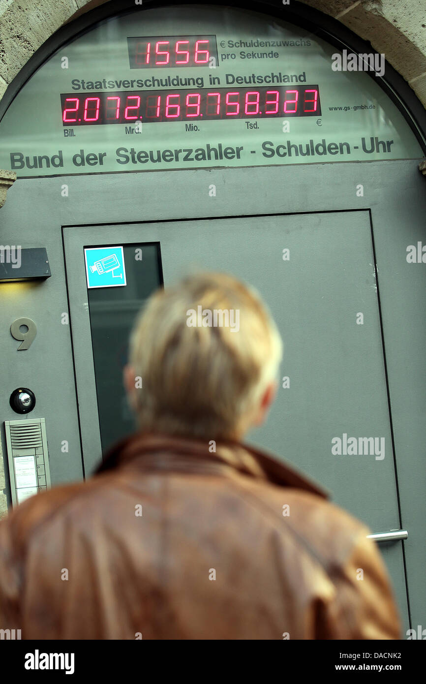 The debt clock shows the sum of 2 billion Euro in Berlin, Germany, 27 ...