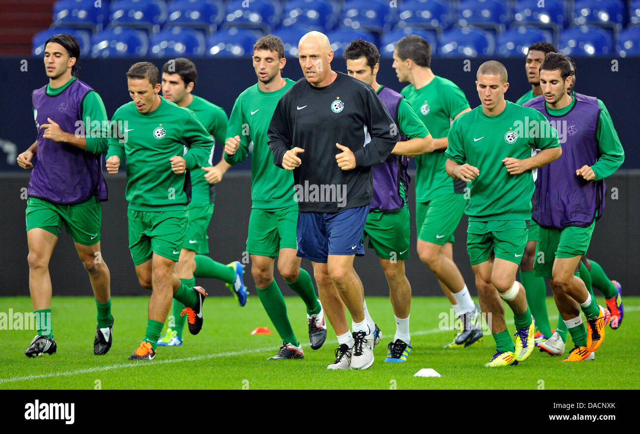 Haifa's players practice with technical coach Goldig Run (C) at Veltins ...