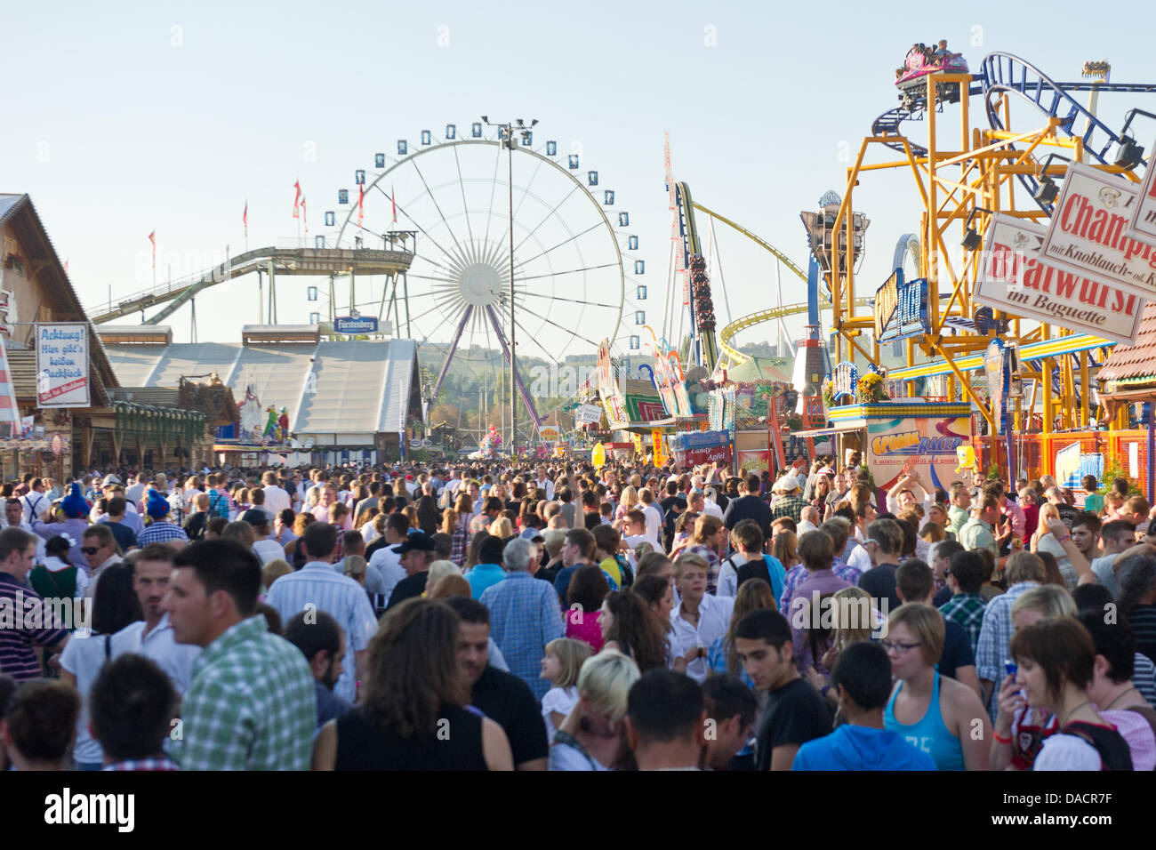 Visitors rush at the grounds of the Canstatt Wasen in Stuttgart ...