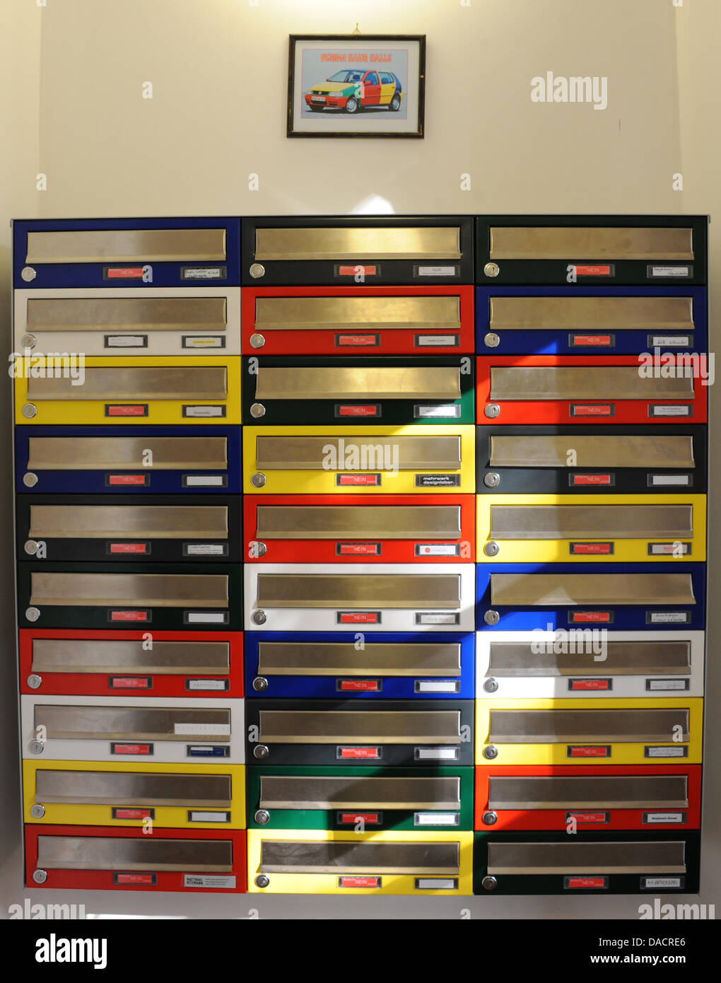Colourful mailboxes are set up inside the entrance hall of the designer ...