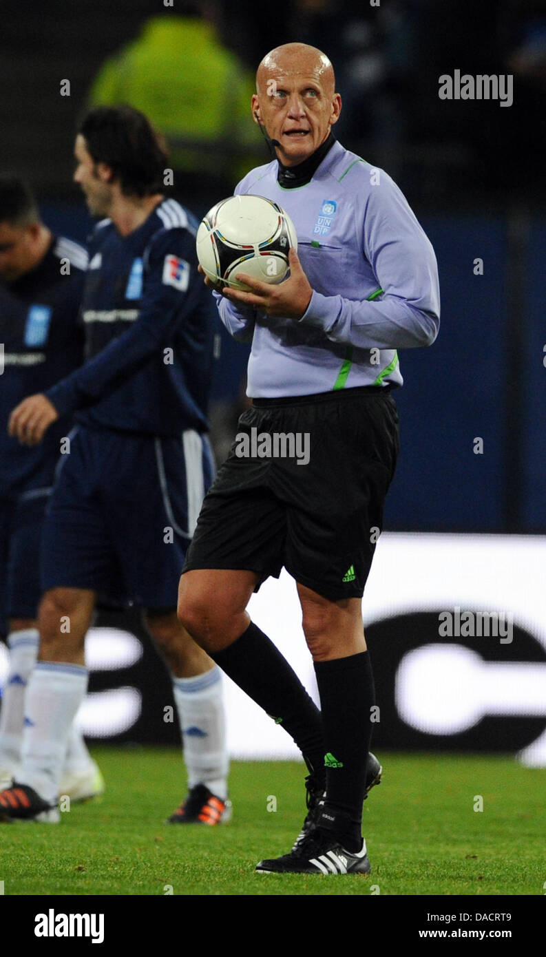 Referee Pierluigi Collina leaves the pitch for half-time during the ...