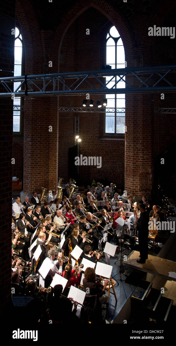 Brass musicians perform during an Advent concert at St. Mary's Church ...