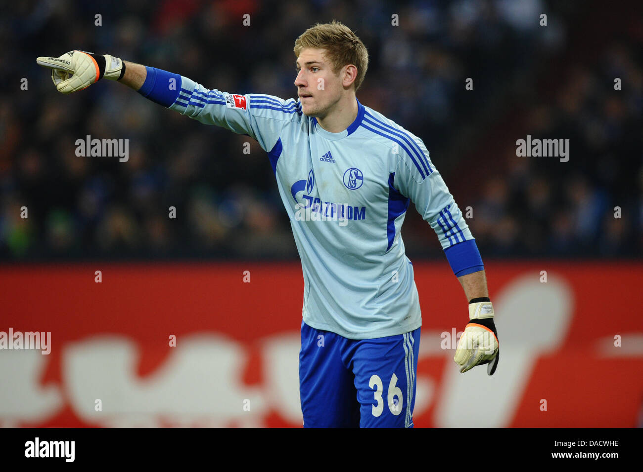 Schalke's goalkeeper Lars Unnerstall points during the Bundesliga ...