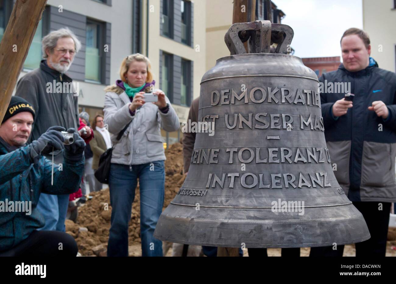 Visitors view the 'Bell for Democracy' which was cast the day before at ...