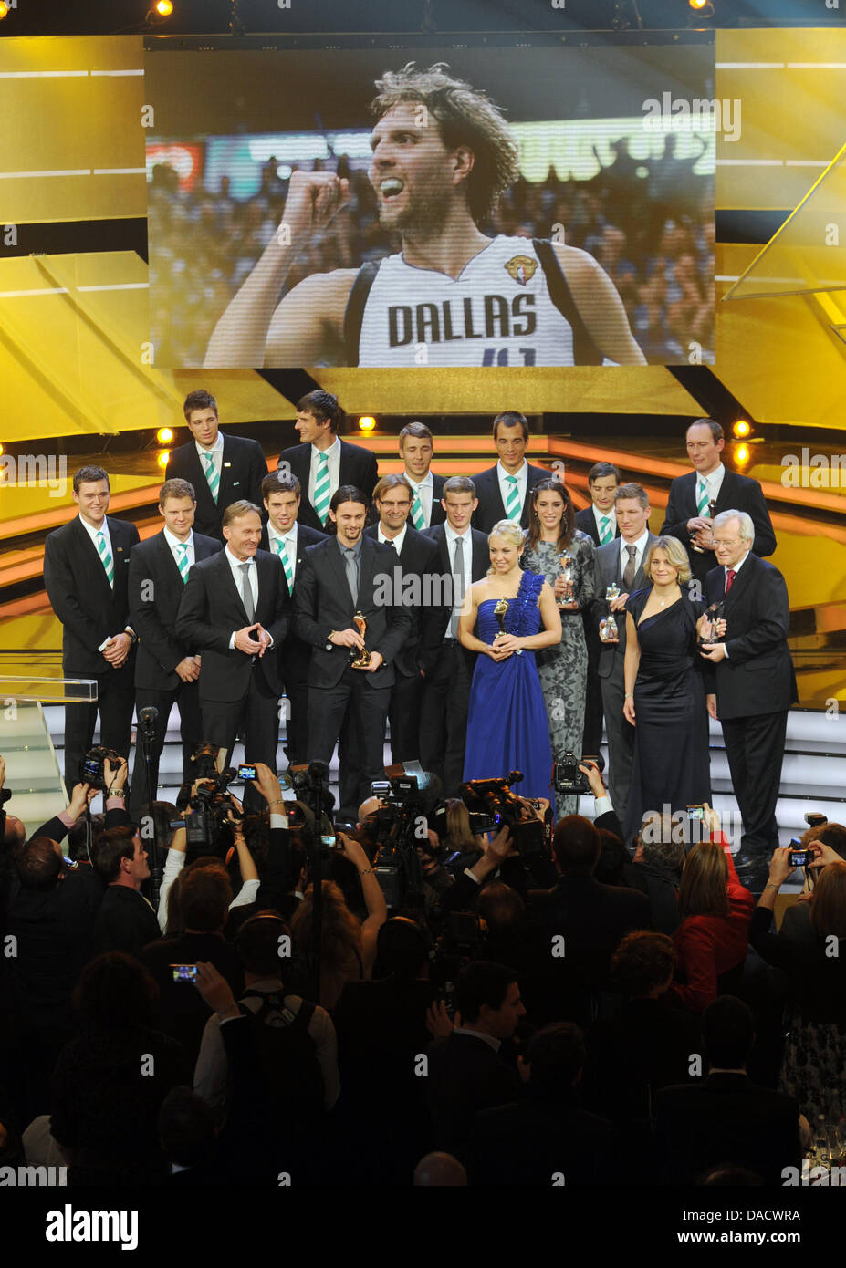 Honoured athletes people pose with their 'Athlete of the Year' awards ...