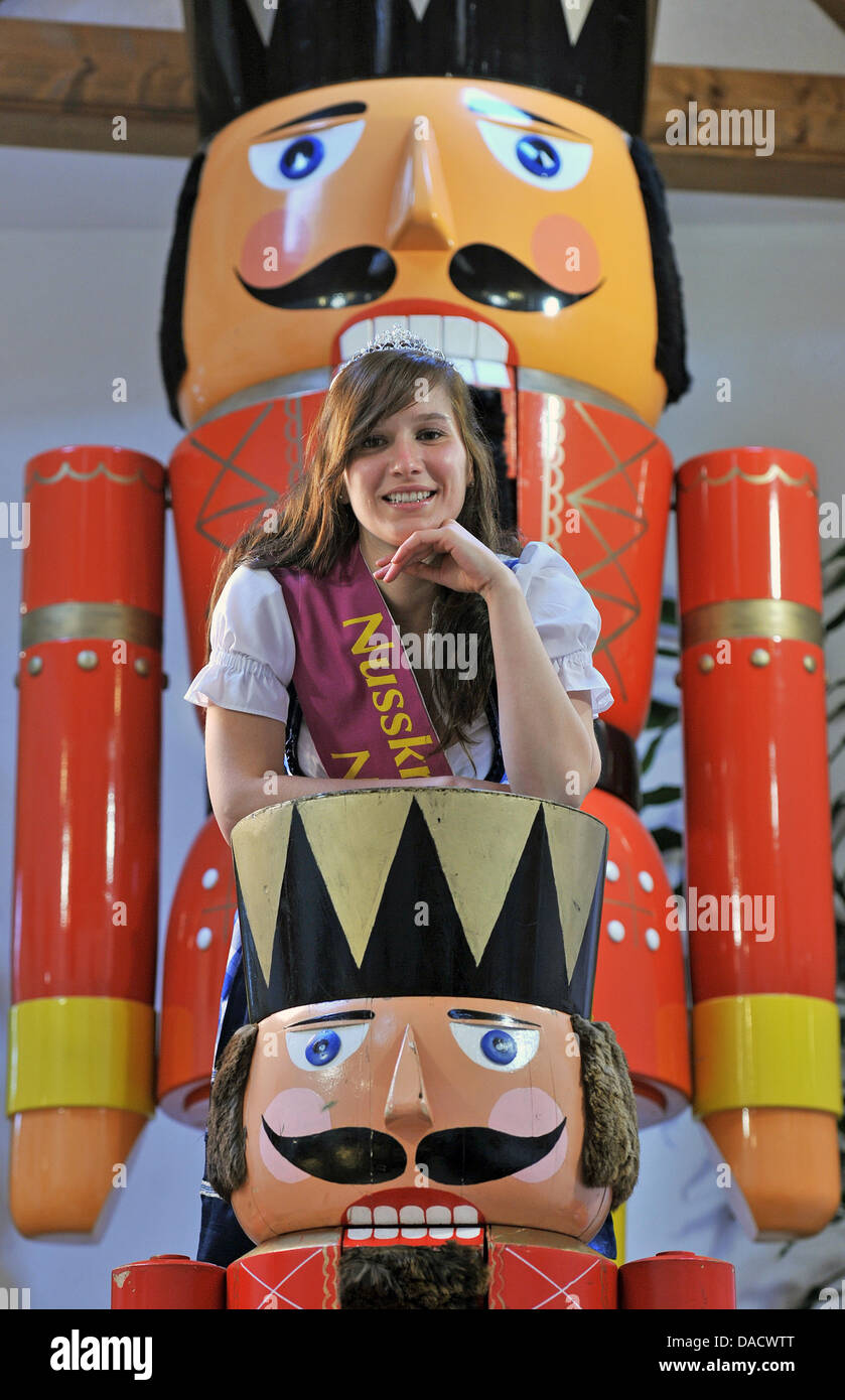 Current nutcracker queen Maria Fritzsche poses with a giant nutcracker ...