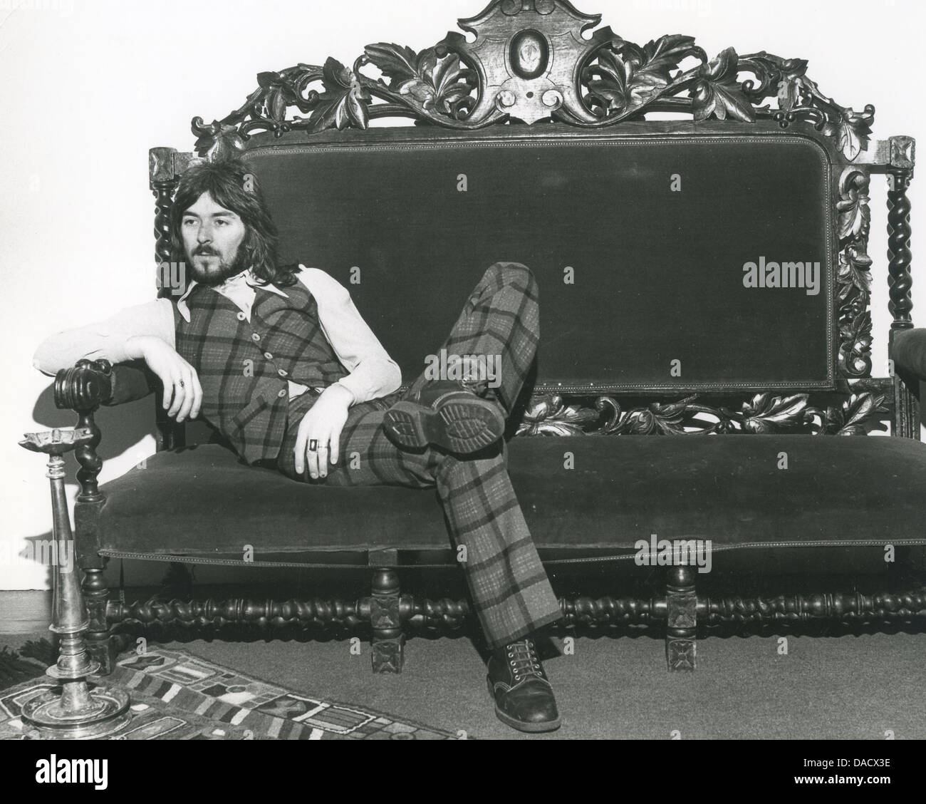 THE FACES UK pop group member Ian McLagan relaxes at home about 1970 ...