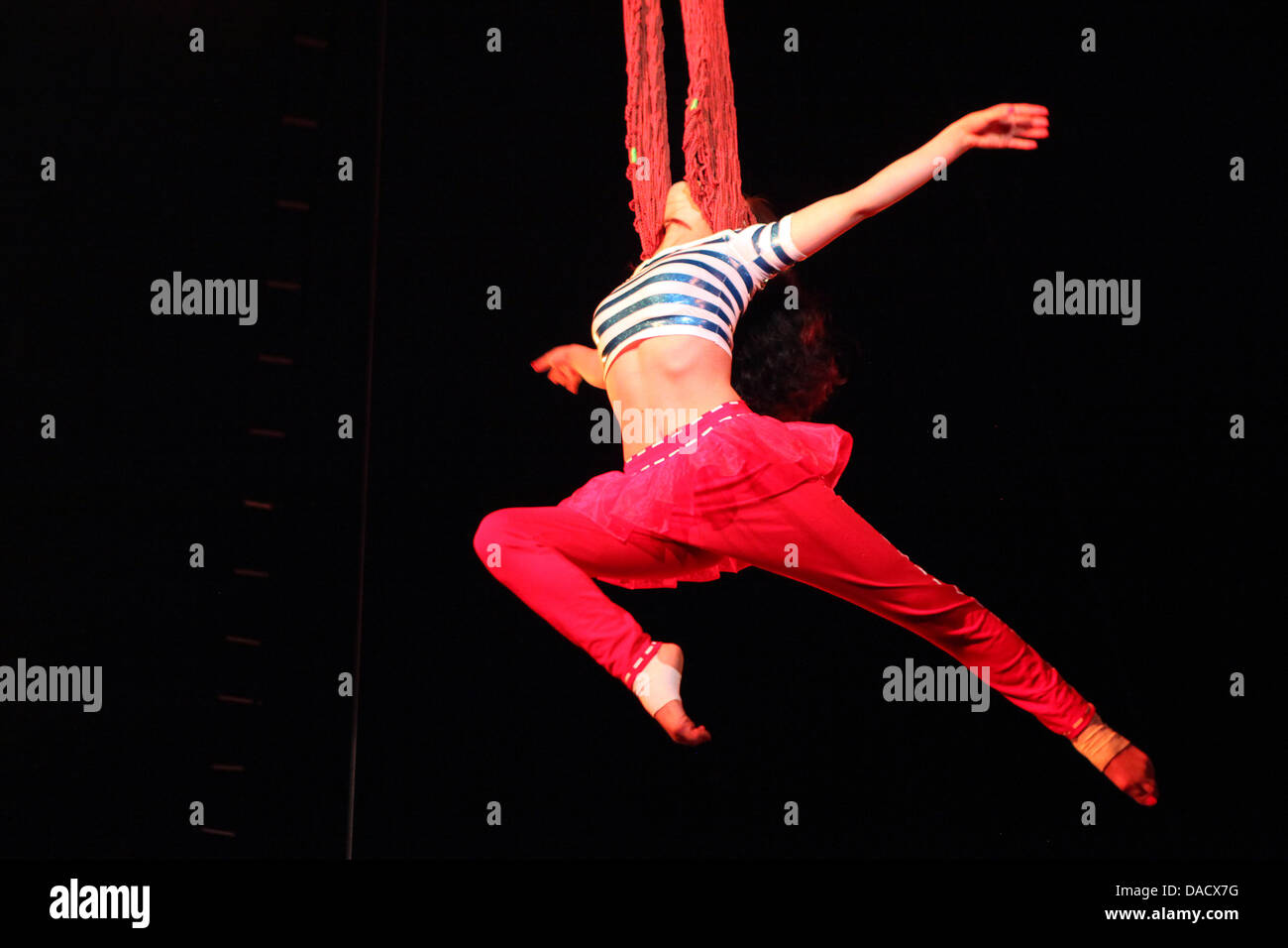 An acrobat of the Chinese state circus floats through the manège held ...