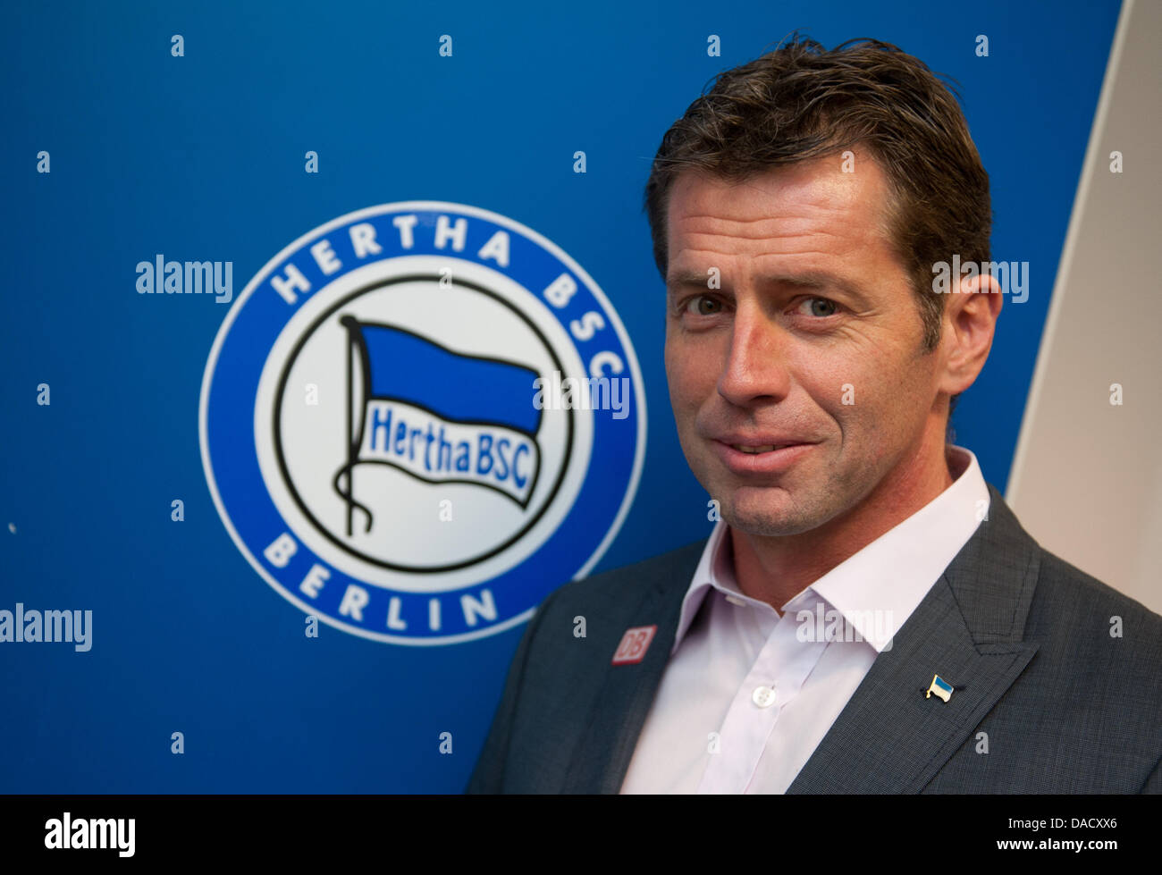 Michael Skibbe smiles during a press event introducing him as new head ...