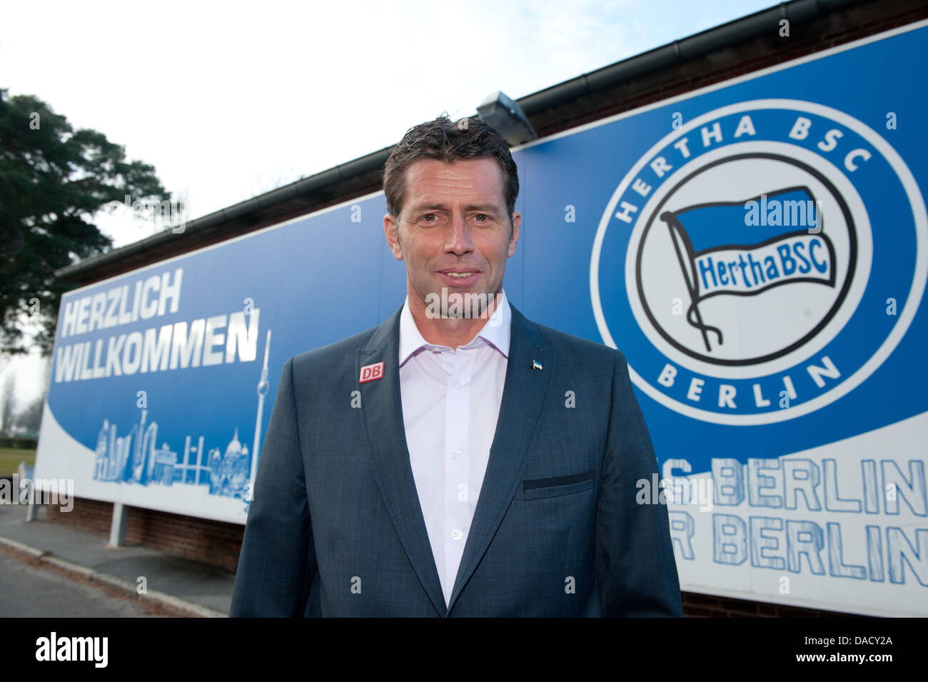 Michael Skibbe smiles after his introduction as new head coach of the ...