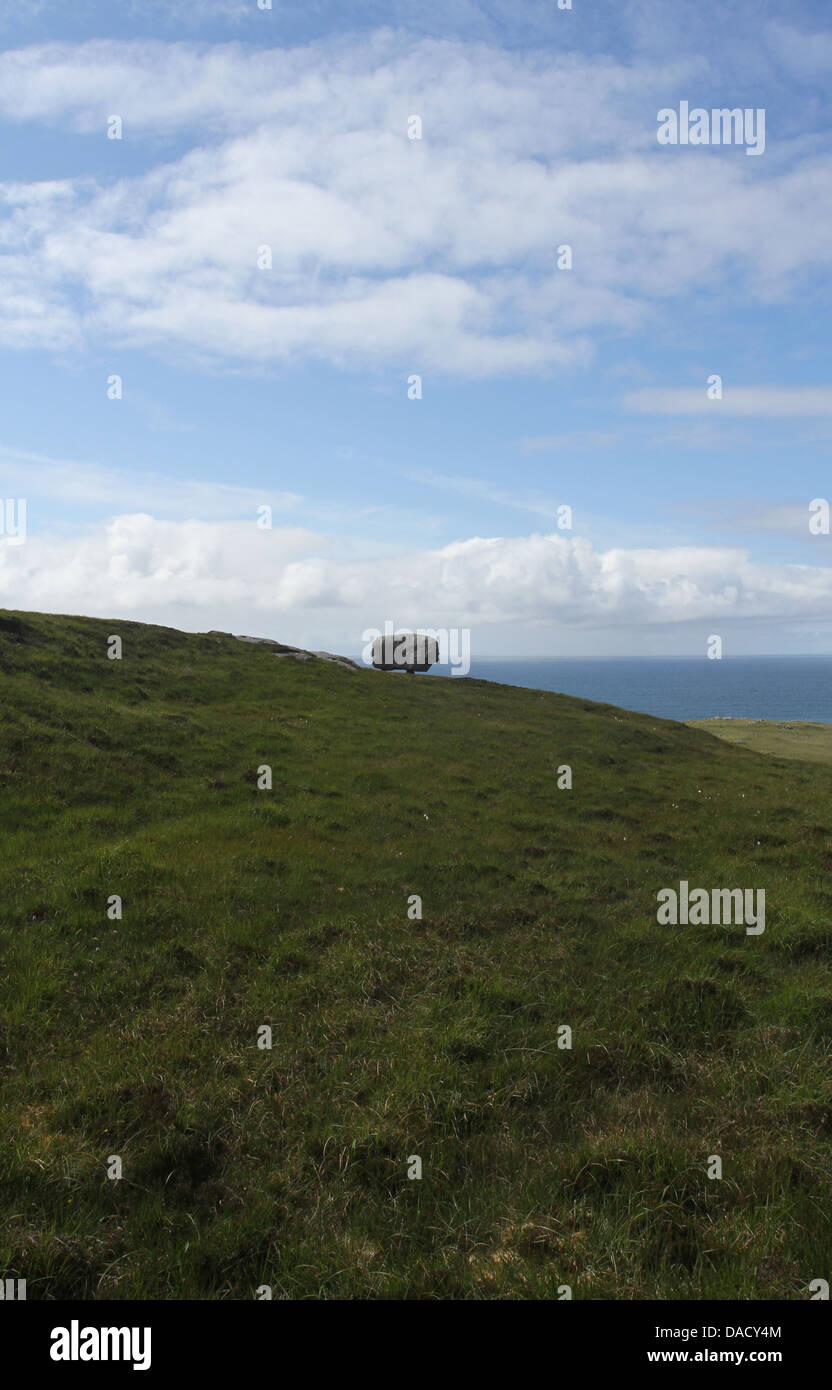 distant view of Balancing stone on Ben Hogh Isle of Coll Scotland July ...