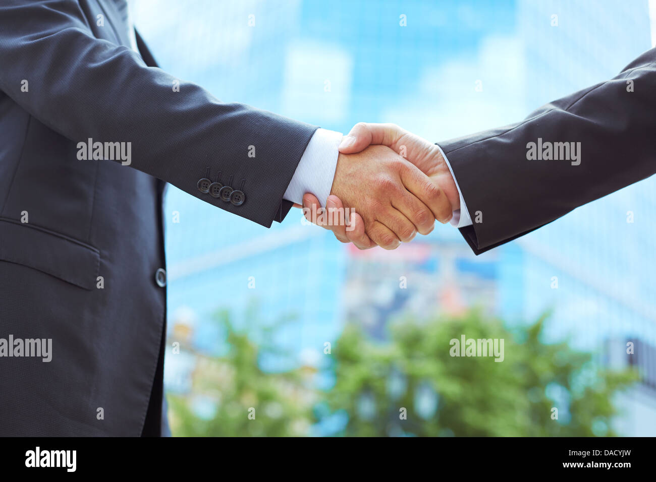 Business associates negotiating deal hi-res stock photography and ...