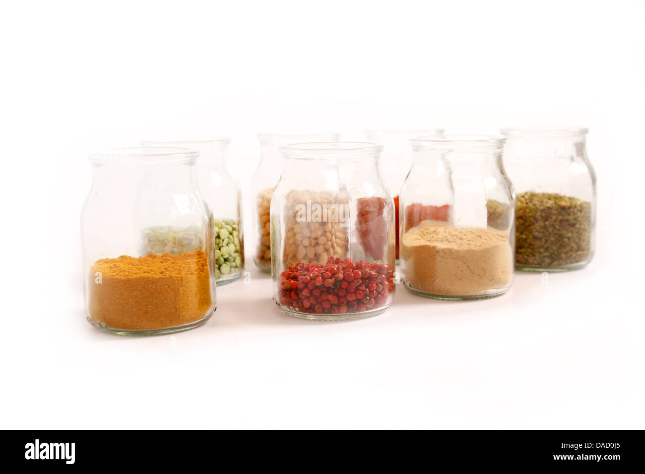 Variety of spices in a glass pot Stock Photo - Alamy