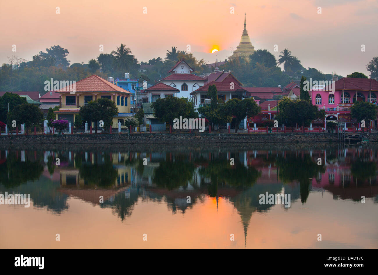 View of Kengtung looking across Naung Tung Lake towards the gilded ...