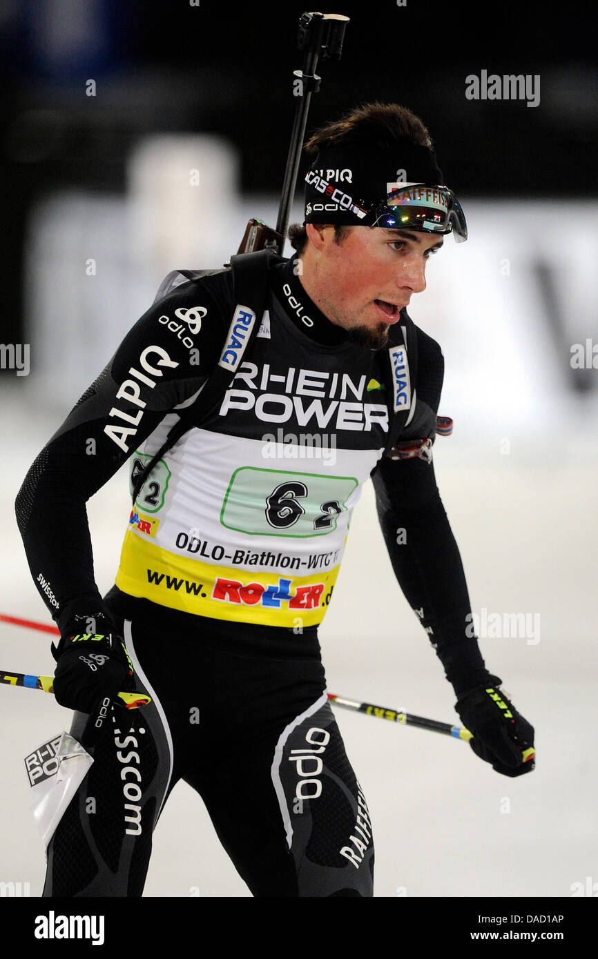 Swiss biathlet Benjamin Weger crosses the finish line during the 10th ...