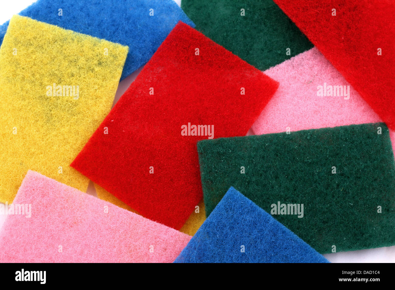 A lot of sponges in different colors background Stock Photo - Alamy