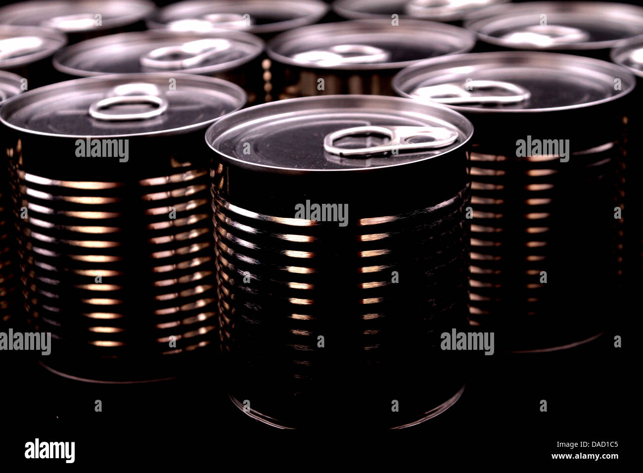 A group of black cans Stock Photo - Alamy