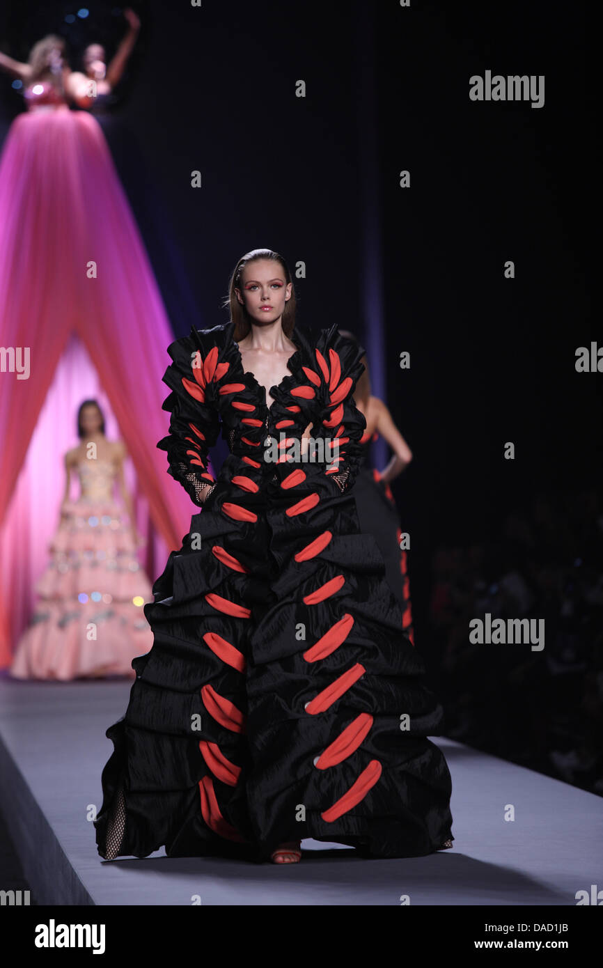 A model wears a creation by Dutch designers Viktor & Rolf as part of ...