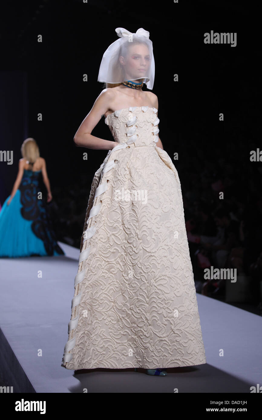 A model wears a creation by Dutch designers Viktor & Rolf as part of ...