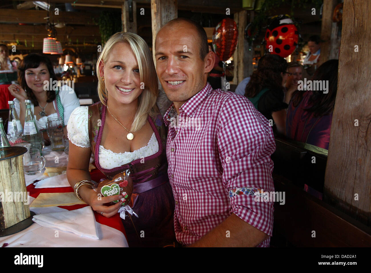 Player of the Bundesliga club FC Bayern Munich, Arjen Robben, and his ...