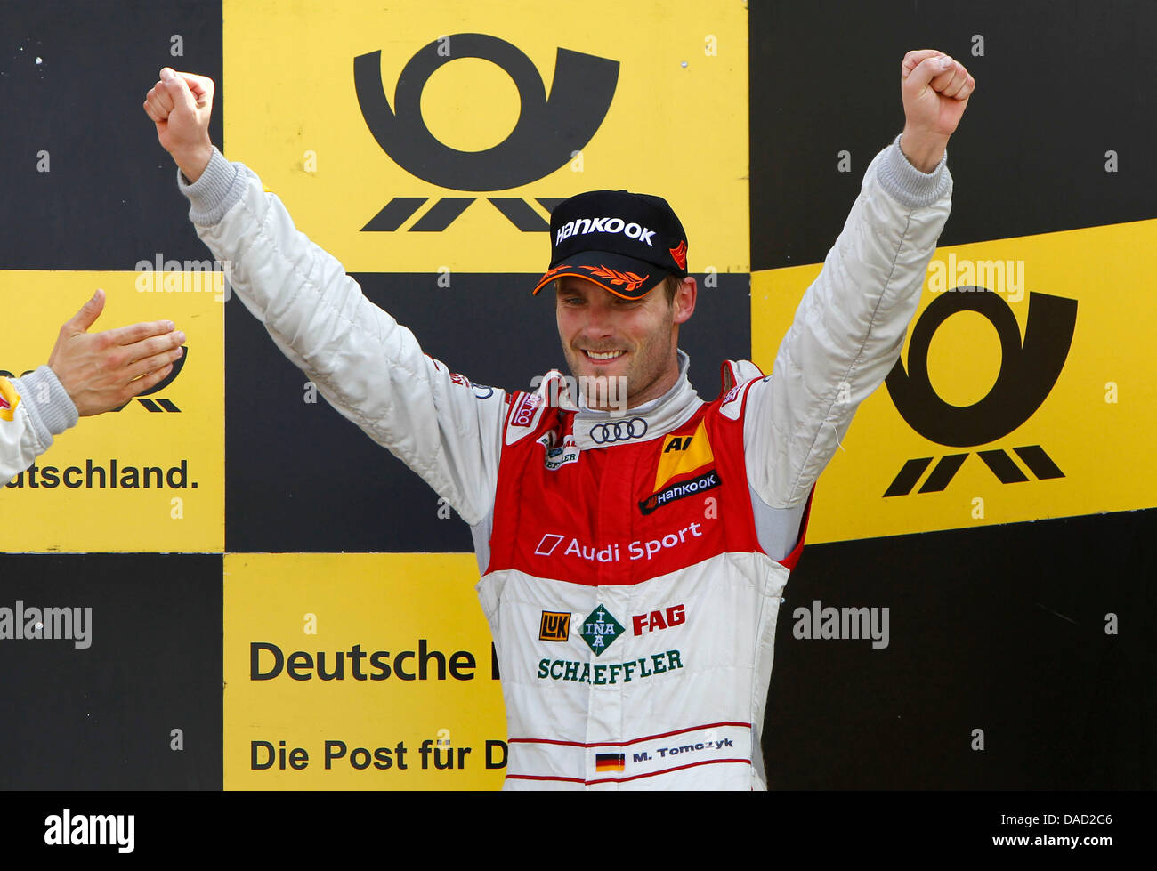 German DTM-driver Martin Tomczyk of Audi Sport Team Phoenix celebrates ...