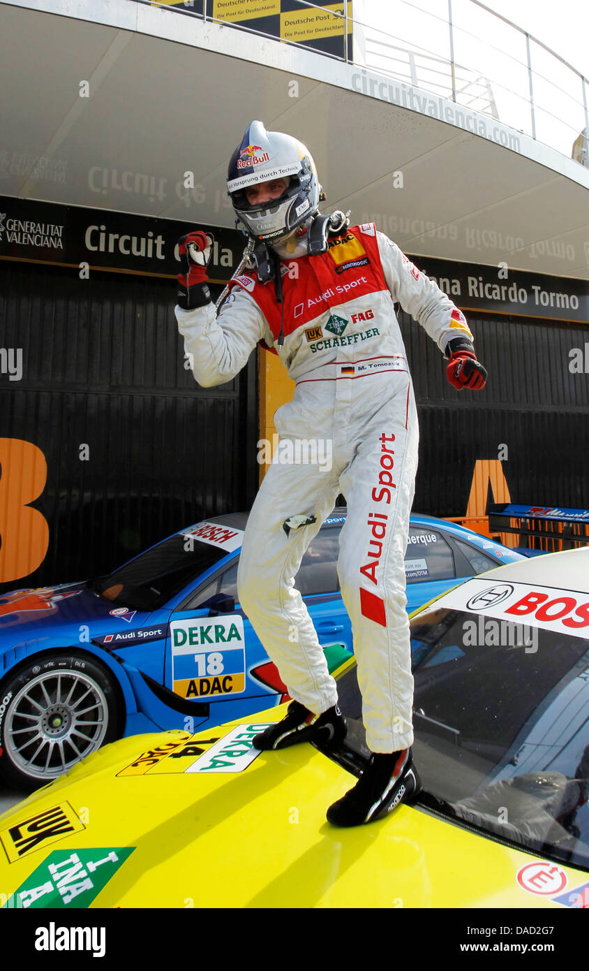 German DTM-driver Martin Tomczyk of Audi Sport Team Phoenix celebrates ...