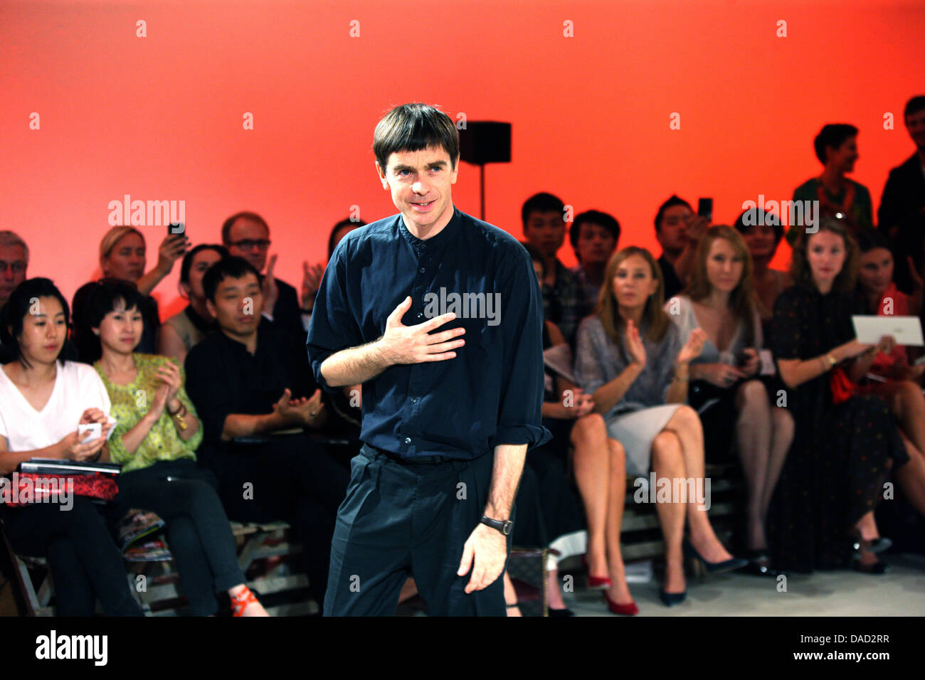 French designer Christophe Lemair appears on stage after Hermes women's ...