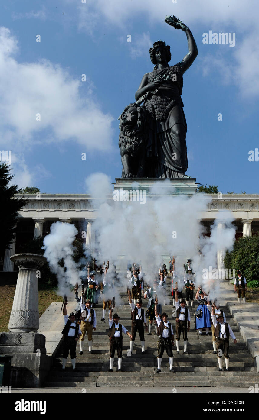 Men in Bavarian clothes shoot the traditional final salutes on the ...
