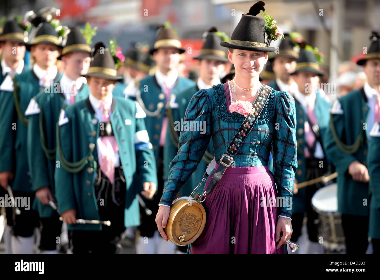 Members of a Bavarian marksmen club participate in a parade on German ...