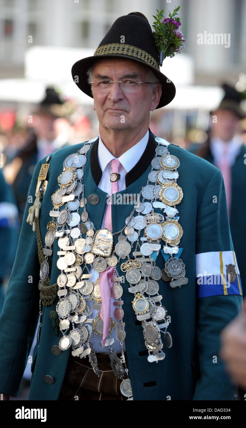 Members of a Bavarian marksmen club participate in a parade on German ...