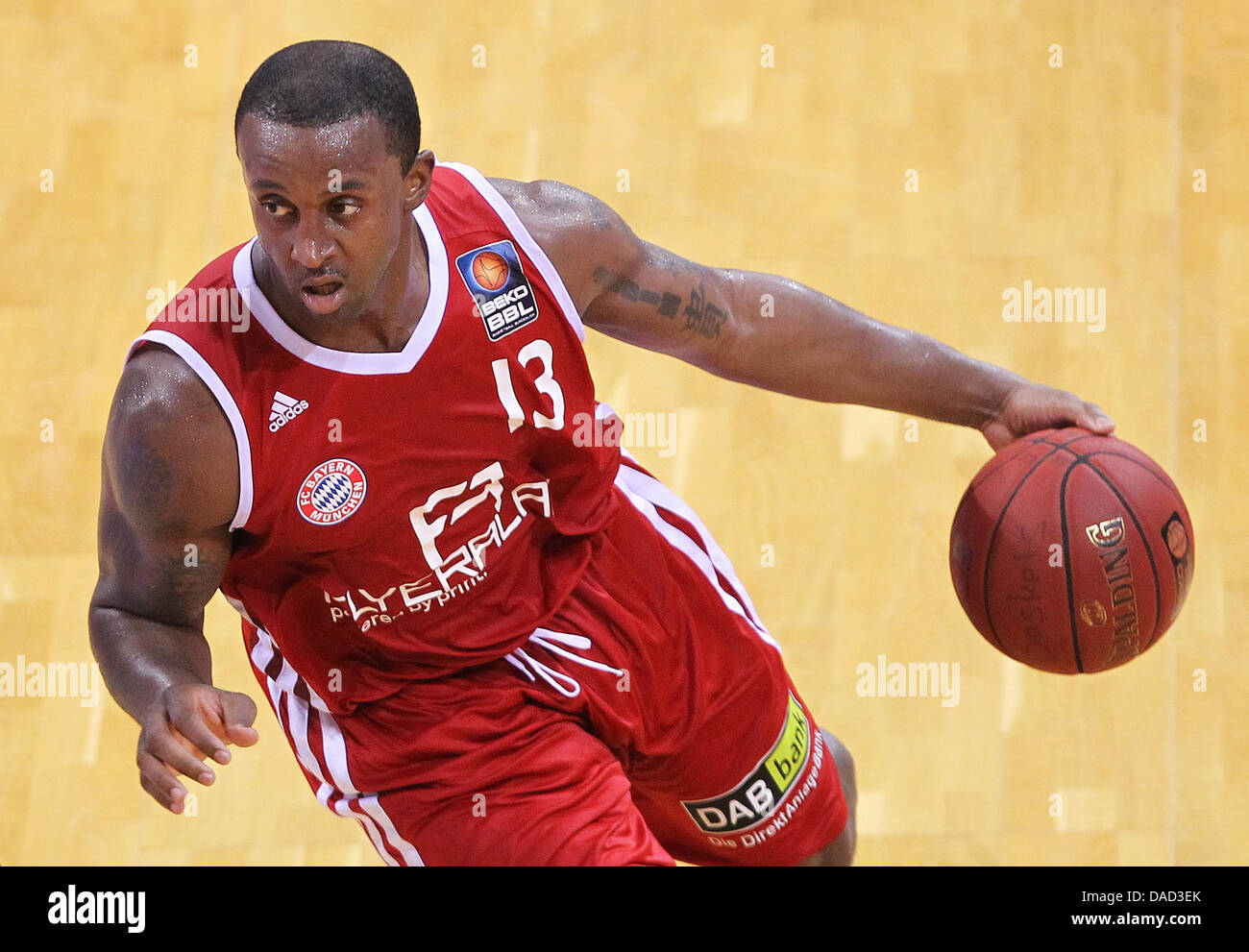 Munich's Je'Kel Foster plays the ball during the German BBL Basketball ...