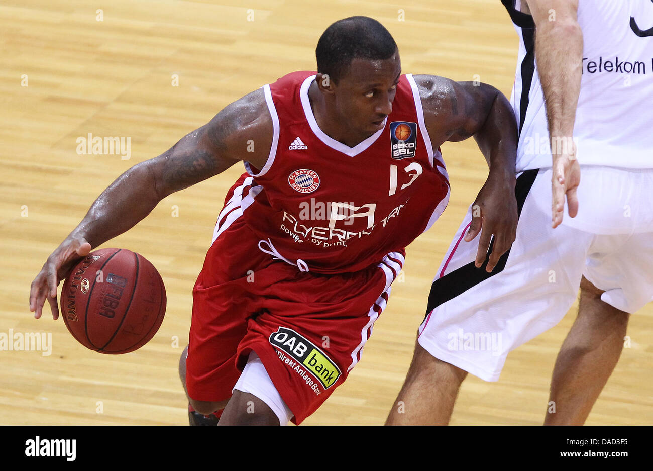 Munich's Je'Kel Foster plays the ball during the German BBL Basketball ...